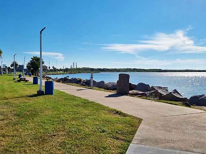 The shoreline pathway offers peaceful strolls with industrial ship channel views that remind you Texas never stops working.