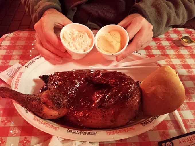 Half a chicken with two sides demonstrates the generous portions that have built this restaurant's loyal following over time.