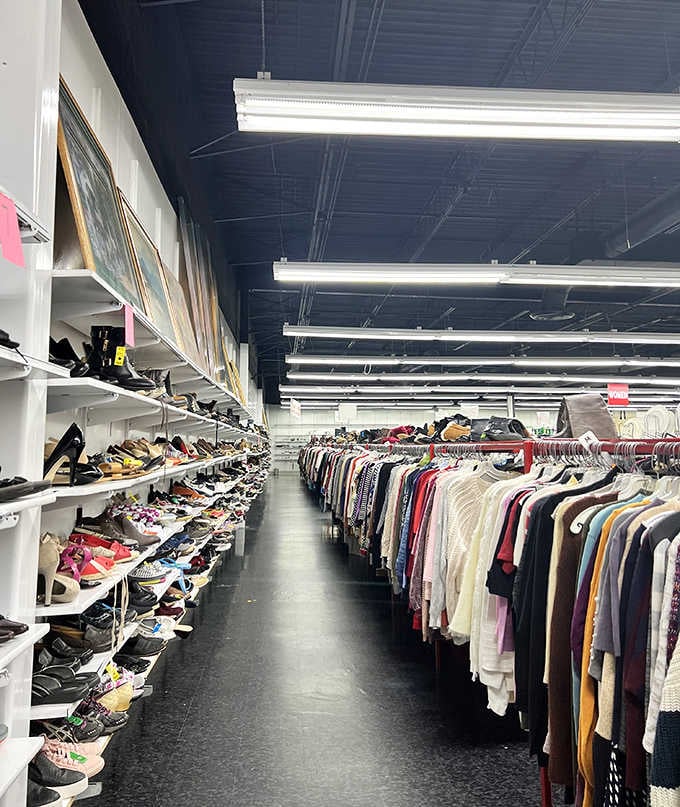 The clothing aisles curve and wind endlessly, a maze where getting lost actually saves you money somehow.
