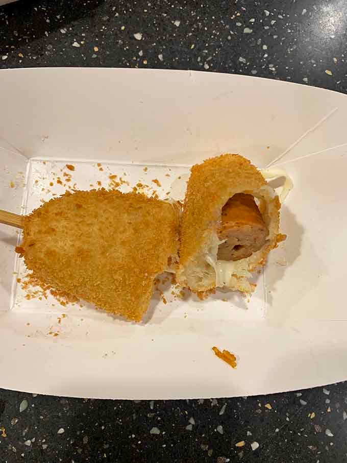 Half-eaten evidence of the mozzarella magic happening inside&mdash;that cheese doesn't quit stretching until you make it.