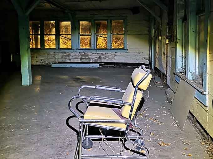 That lonely medical chair sits waiting for patients who'll never return, like furniture from a particularly unsettling time capsule.