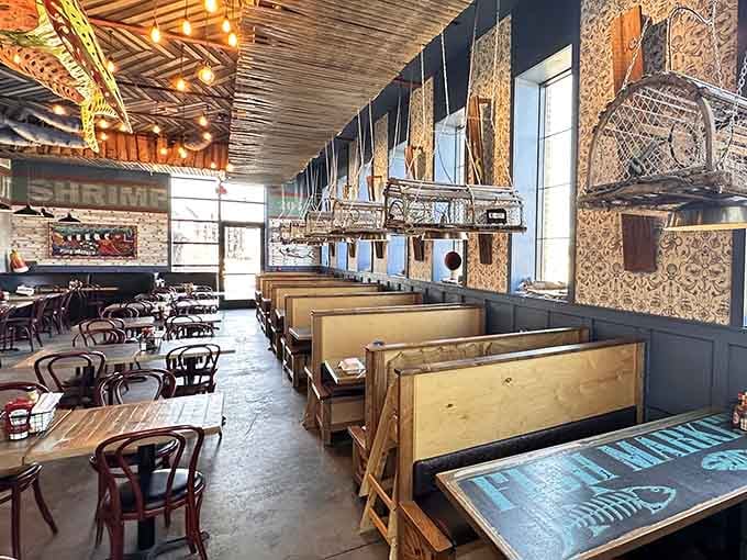 Soaring ceilings and nautical lighting fixtures create an airy atmosphere that feels both upscale and wonderfully relaxed.