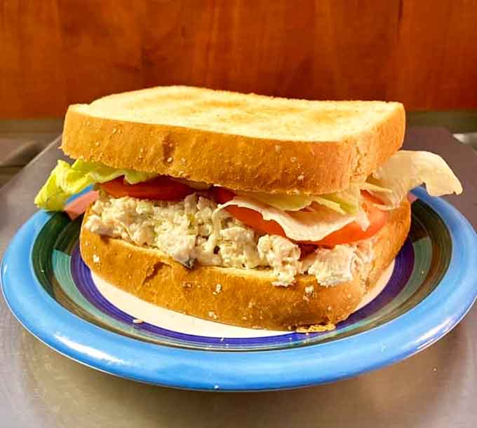 Chicken salad on toasted bread proves lunch doesn't need to be complicated to be perfect.