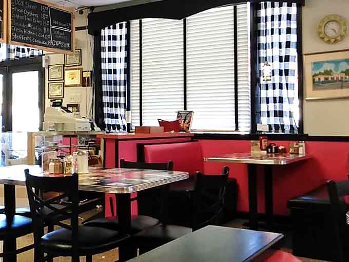 Red vinyl booths and classic diner tables creating the kind of atmosphere Instagram wishes it could filter.