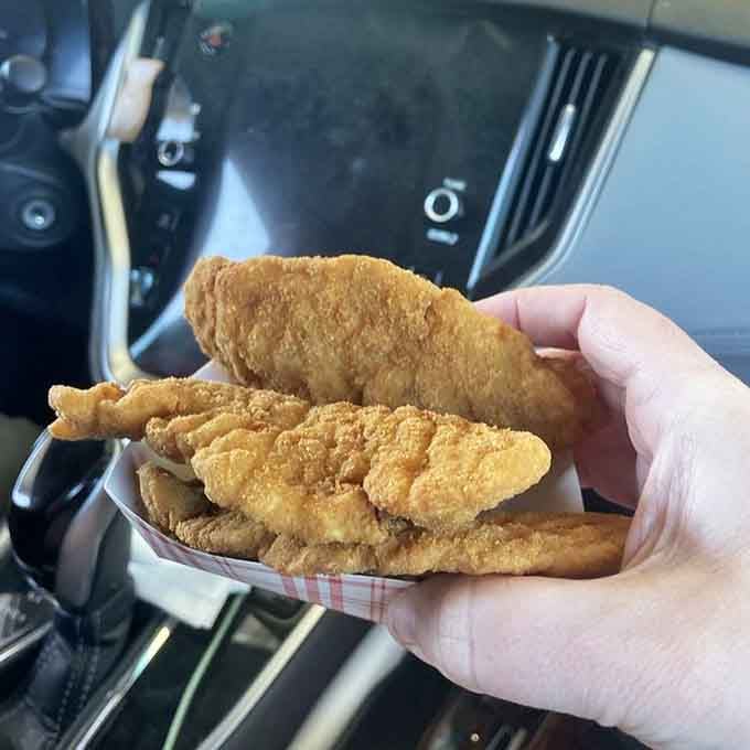 Golden chicken fingers emerge from the fryer crispy and perfect, proving that sometimes the classics can't be improved upon.