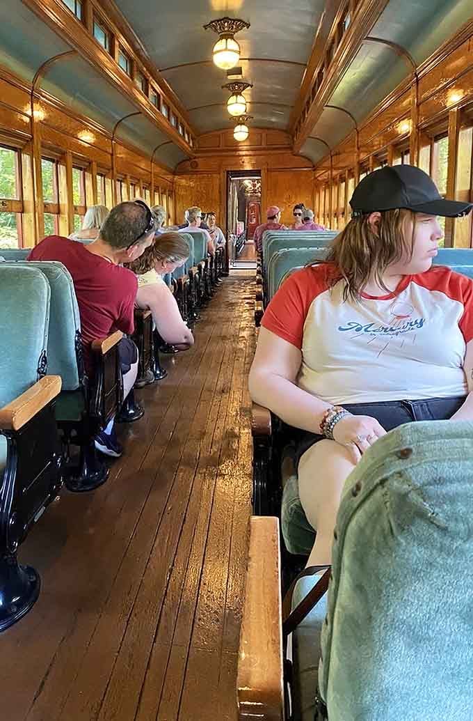 Wooden benches and vintage lighting welcome passengers eager to experience authentic railroading from another century entirely.