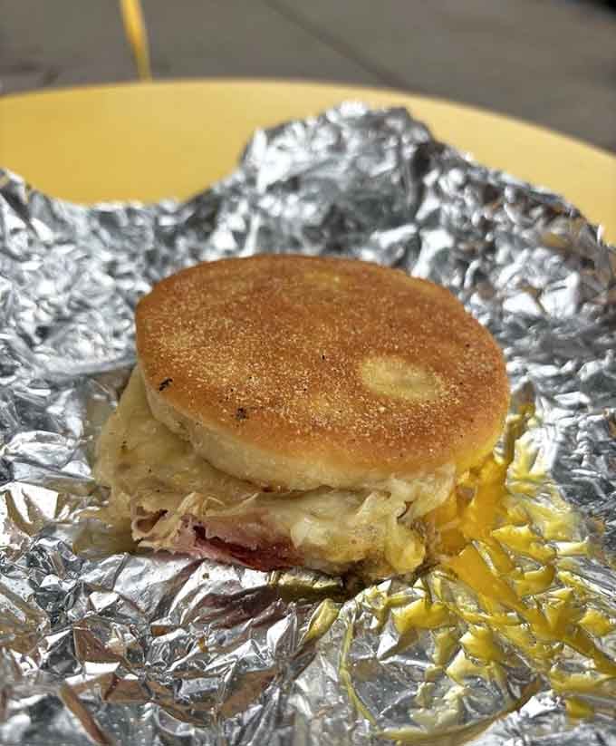 A fried egg sitting pretty on a muffin like it owns the place, because honestly, it does own the place.