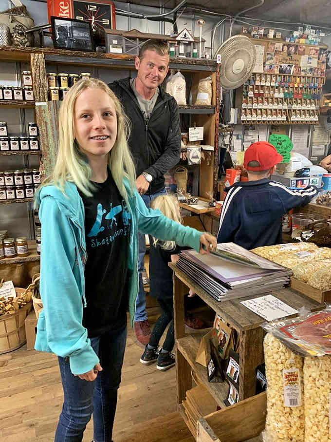 Happy customers discovering that yes, a general store can absolutely change your entire day's trajectory.