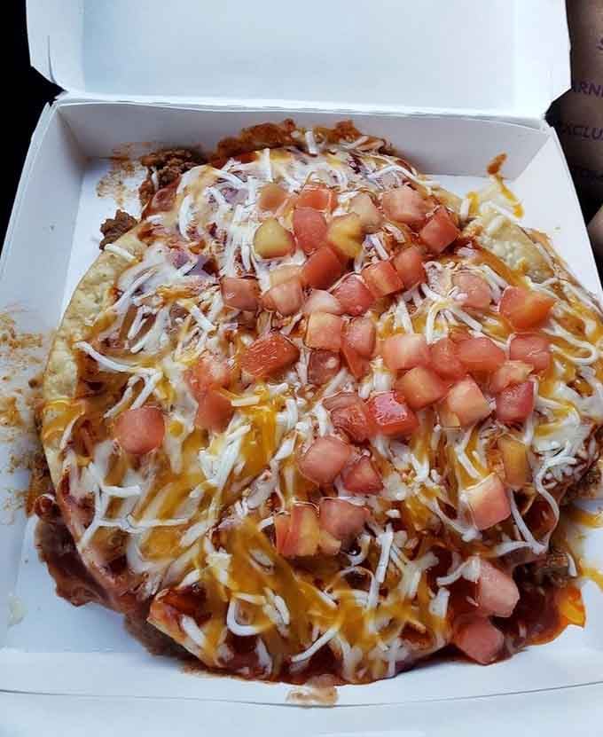 The Mexican Pizza makes its glorious appearance, layered with everything that makes life worth living.