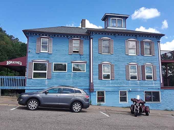 Romayne's blue facade stands out like a beacon for hungry travelers who appreciate buildings with personality and good food inside.