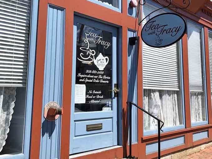 The light blue door and charming signage practically beg you to come inside and stay awhile.