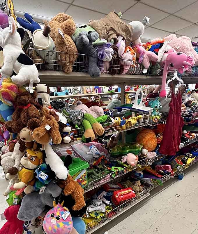 Stuffed animals piled high in a cuddly avalanche, because every child needs a new friend and every parent needs affordable options.