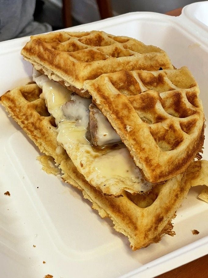 Belgian waffles meet breakfast sandwich in this genius creation that'll make you question all your previous breakfast choices forever.