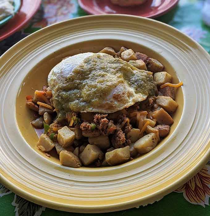 Crispy potatoes topped with eggs and salsa verde deliver the hearty breakfast that cures whatever ails you today.