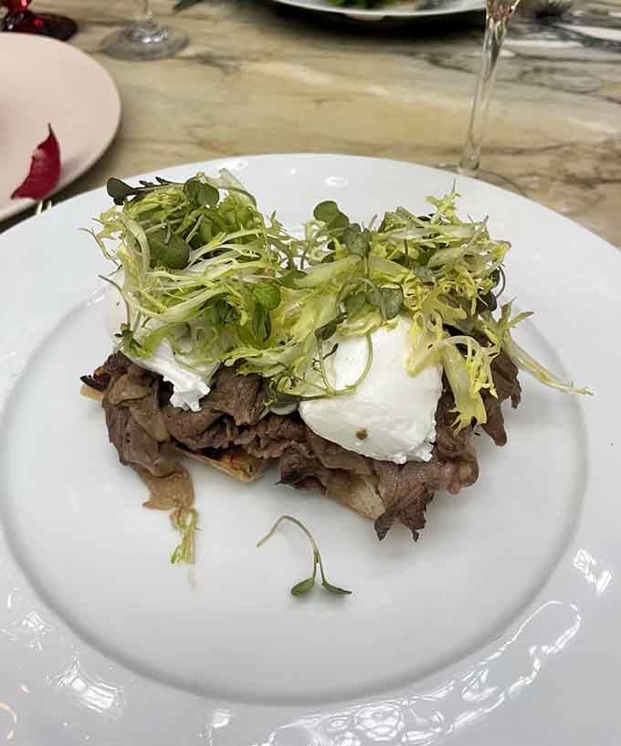 French dip benedict with short rib that redefines what breakfast can be when someone really knows their craft.