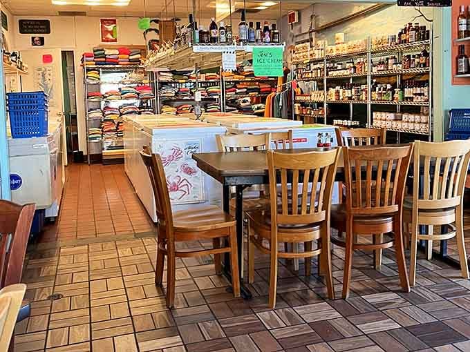 Wooden tables and tile floors create that classic seafood shack vibe where comfort matters more than fancy furniture.