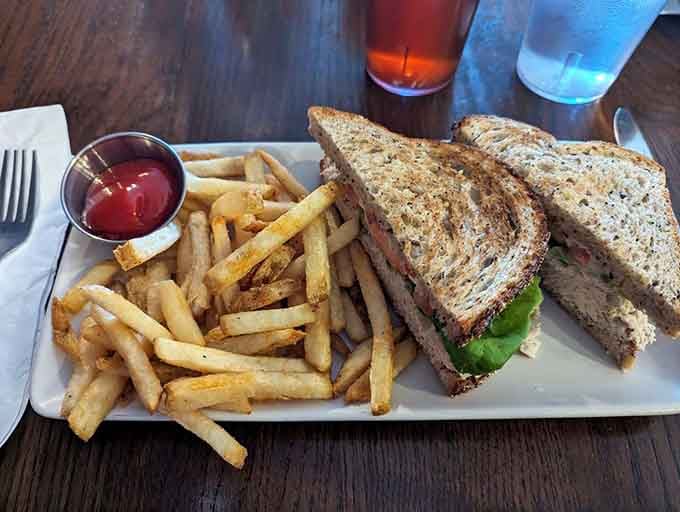 This tuna sandwich on wheat with golden fries hits that perfect lunch spot between healthy intentions and actual deliciousness.