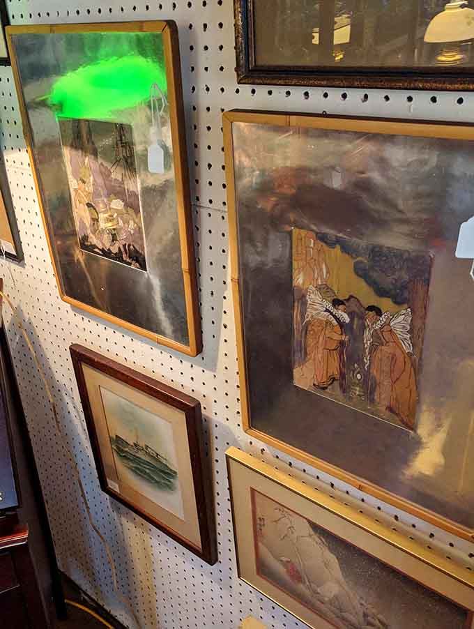 Vintage artwork and movie posters transform blank walls into conversation starters that actually spark interesting discussions.