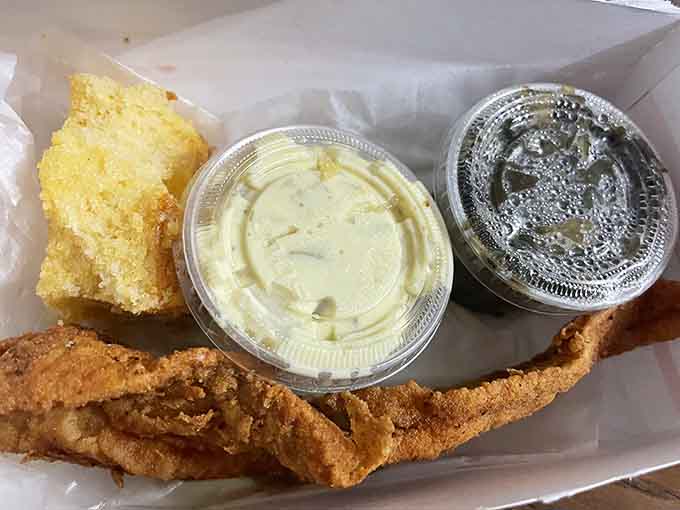 Golden fried catfish with cornbread and sides, because sometimes you need a break from all that glorious smoke.
