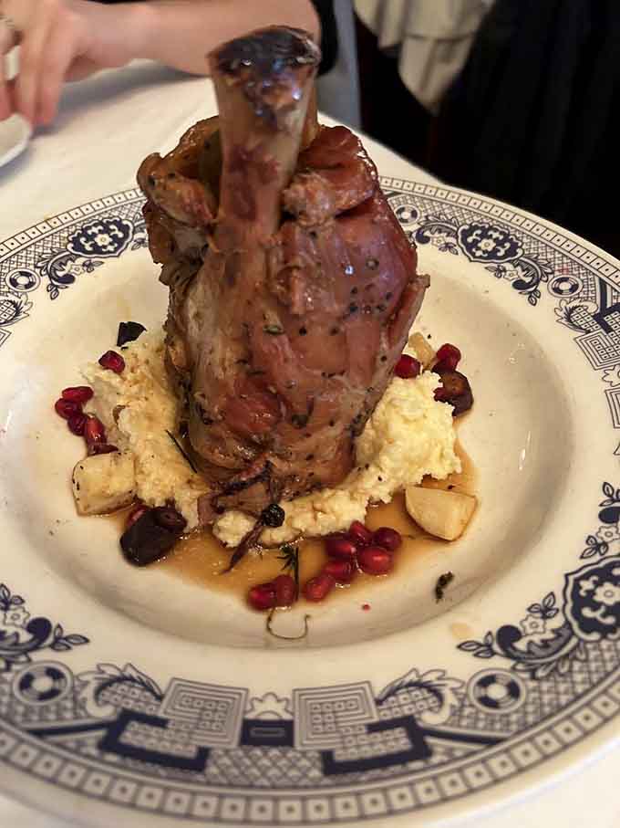 This pork shank presentation looks like it belongs in a food museum, right before you devour every delicious morsel.