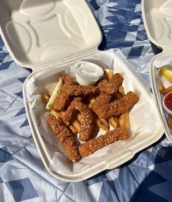 Calamari strips with a golden crust that would make the Midas touch jealous, served beachside perfection.