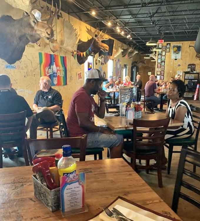 Happy diners surrounded by quirky decor, the universal sign that you've discovered something special and delicious.