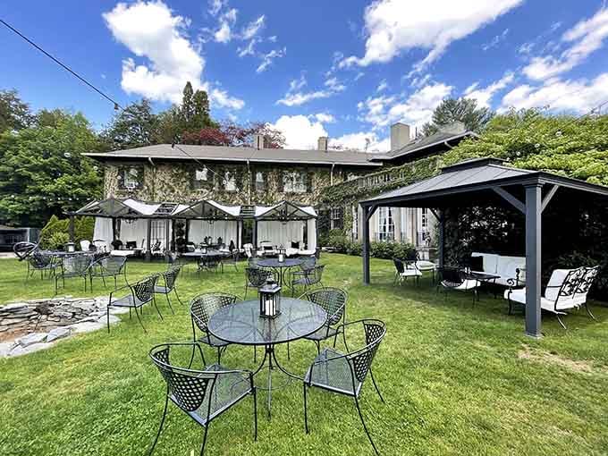 Stone walls and outdoor seating under blue skies prove that al fresco dining beats fluorescent lights every single time.