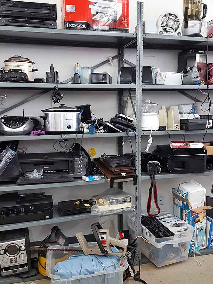 From slow cookers to printers, this shelf holds more abandoned New Year's resolutions than a gym in February.