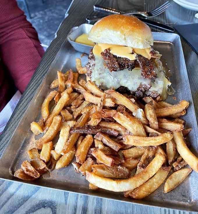 Half a pound of Black Angus beef topped with all the right things, surrounded by crispy fries screaming your name.