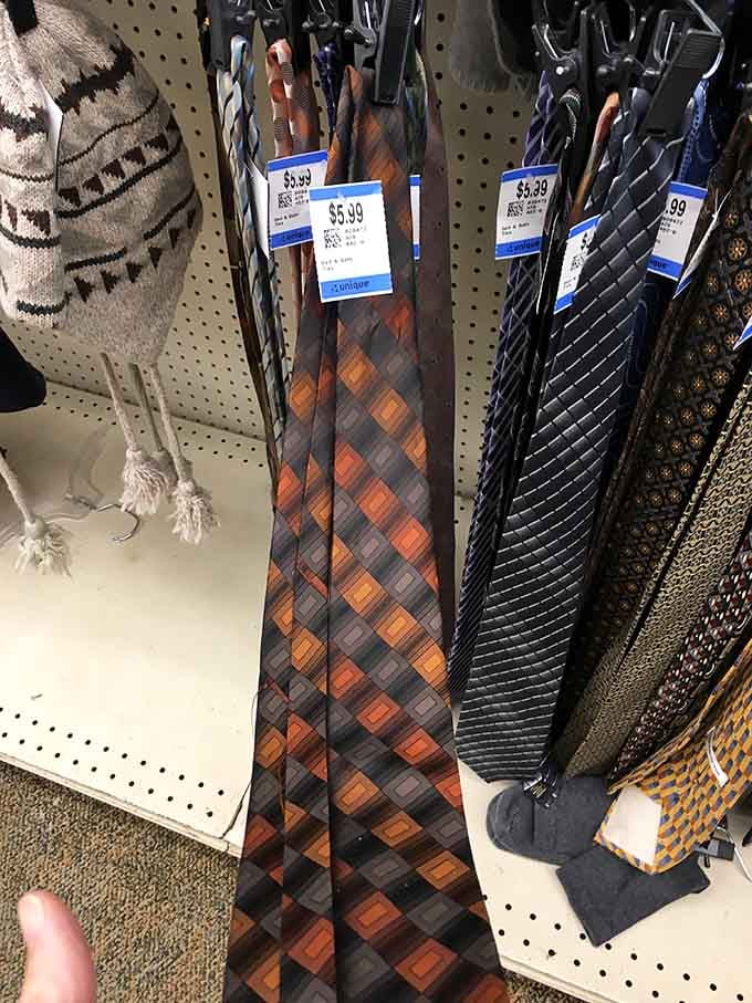 Neckties for every occasion, because apparently someone thought orange plaid was absolutely essential office wear.