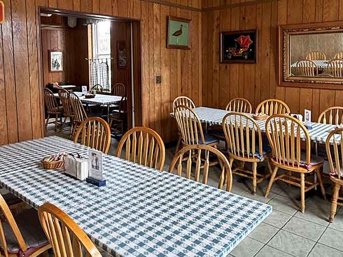 Wood-paneled walls and comfortable seating create that timeless diner atmosphere where good food and conversation flow equally well.