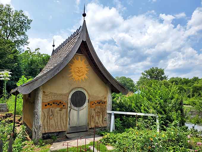 This whimsical structure with its sunny face proves gardens can have a sense of humor too.