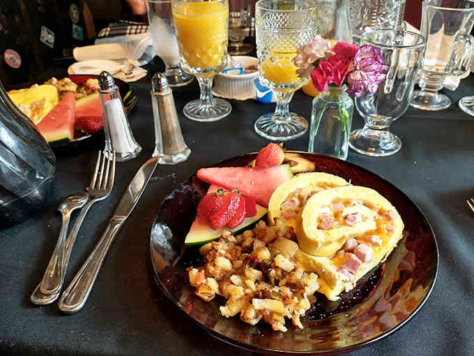 Breakfast served on fine china in a train car proves that roughing it is completely optional here.