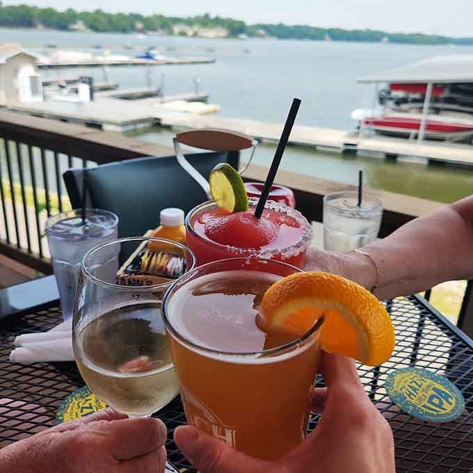 Waterfront cocktails with citrus garnishes catching the light: liquid sunshine in glass form, basically.