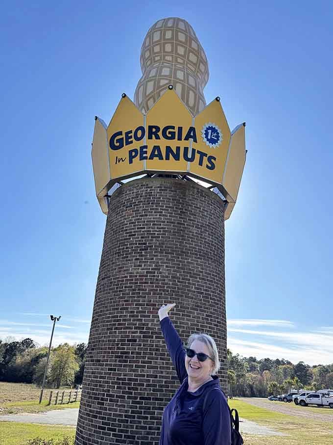The universal pose: pointing up at something ridiculously large while grinning like you've discovered buried treasure in South Georgia.