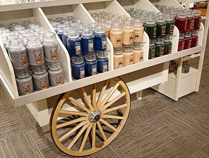 That wagon display is doing more heavy lifting than most furniture, supporting what appears to be several months' worth of ambiance.