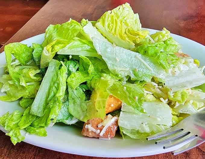 Fresh, crisp romaine proves that Zip's can do healthy too, though nobody's judging if you skip it.