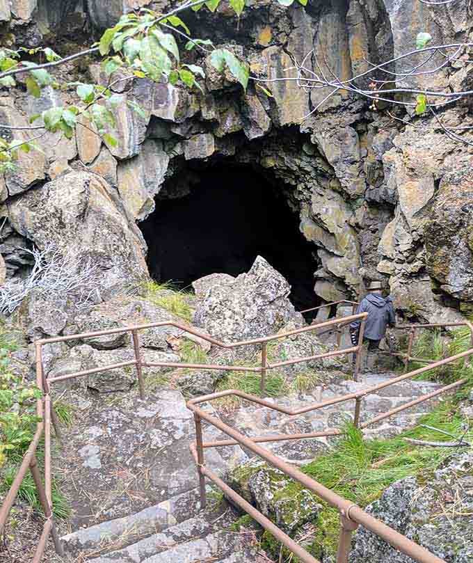 Metal walkways guide you safely through this underground tunnel, where volcanic history surrounds you on all sides.
