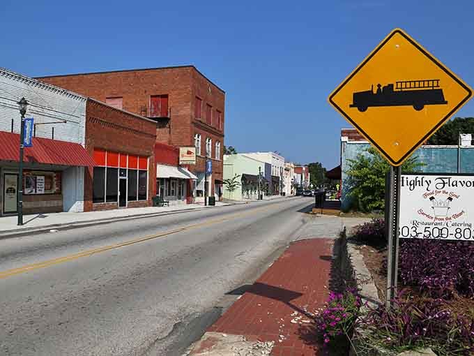 Even the fire truck crossing sign has character here, warning you to slow down and pay attention to community.