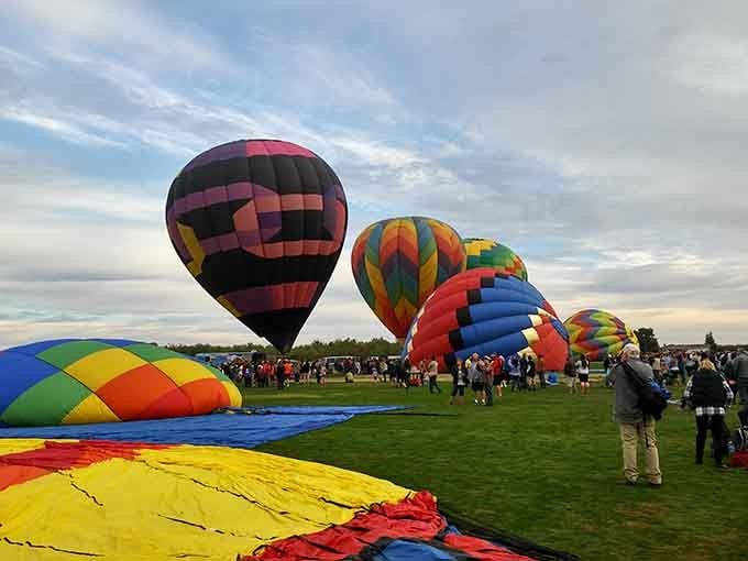 Hot air balloons fill the sky like giant floating jellybeans, creating a spectacle that beats any fireworks display hands down.