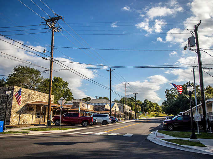 American flags wave over quiet streets where neighbors still know each other's names and wave from their porches.