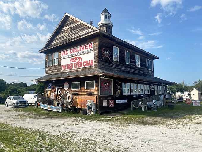 This weathered two-story building wears its age like a badge of honor earned through decades of service.