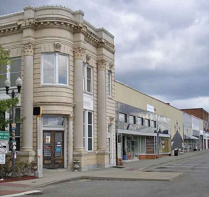 This corner building's ornate stonework and curved windows showcase the kind of craftsmanship they just don't do anymore.