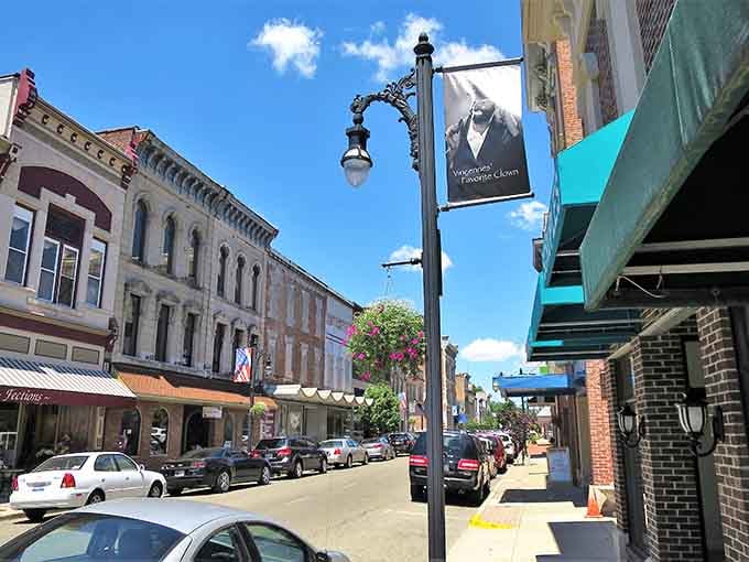 Vintage street lamps and welcoming banners show a community that knows how to roll out the red carpet daily.