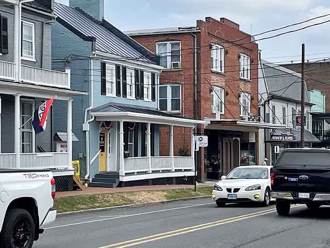 Historic storefronts wear their age gracefully, each window holding treasures that survived when others didn't make it.