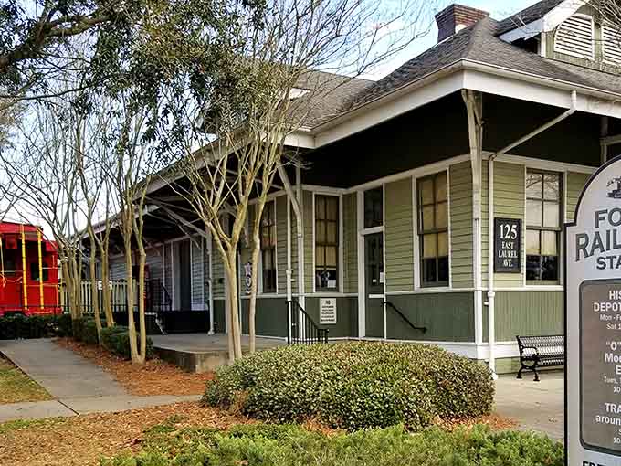 The green and cream color scheme gives this historic depot a fresh, inviting look that honors its working railroad heritage.