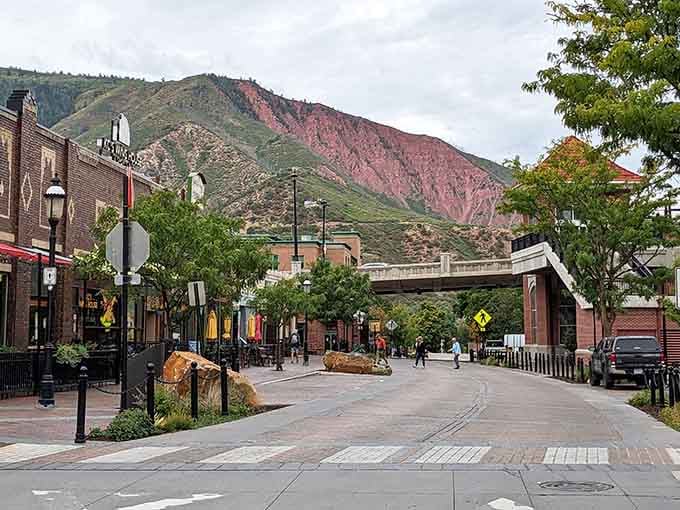 Those layered red mountains create nature's own painted backdrop for a downtown that knows how to blend charm with character.
