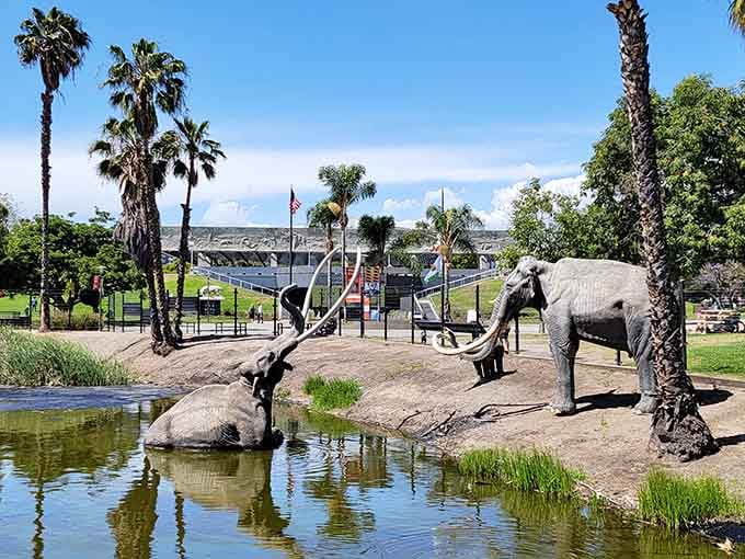 Life-size mammoth sculptures stand near the lake, recreating a prehistoric scene when these pits trapped unsuspecting giants.