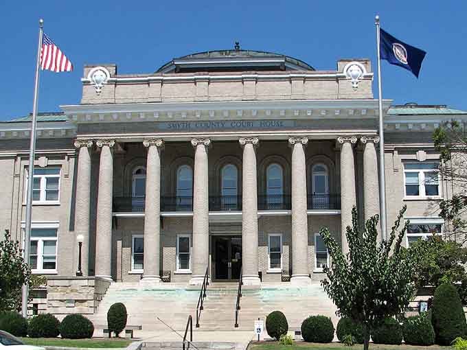Those grand courthouse columns command respect while the manicured lawn invites you to sit and stay awhile longer.