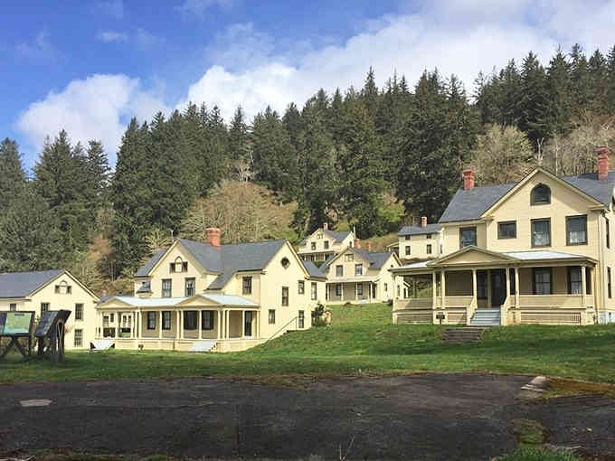 Historic structures nestle into hillsides where forest meets community, creating harmony between nature and neighborhood life.